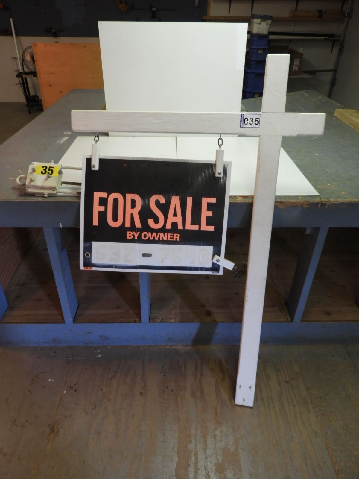 "For Sale" sign post with ground mount holder