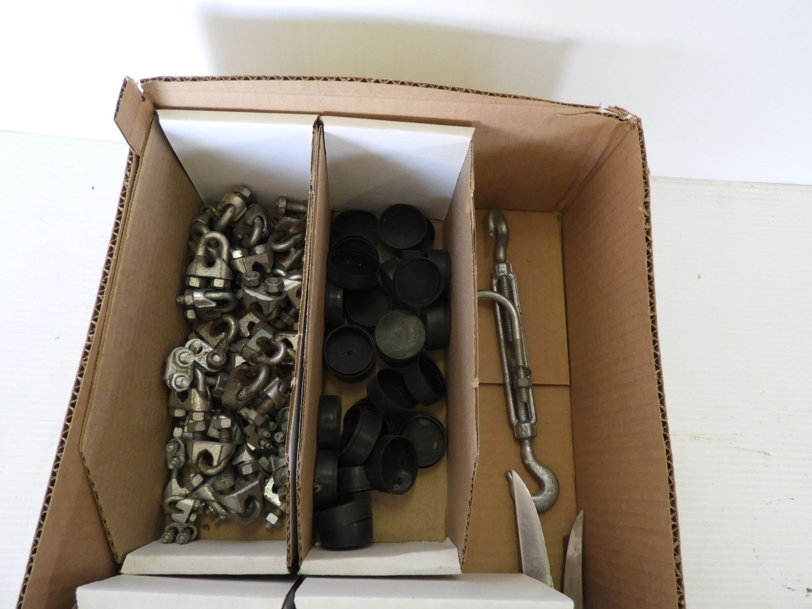 Cable clamps. Plastic end caps, turnbuckle, U-bolt, anti-vibration pads ...