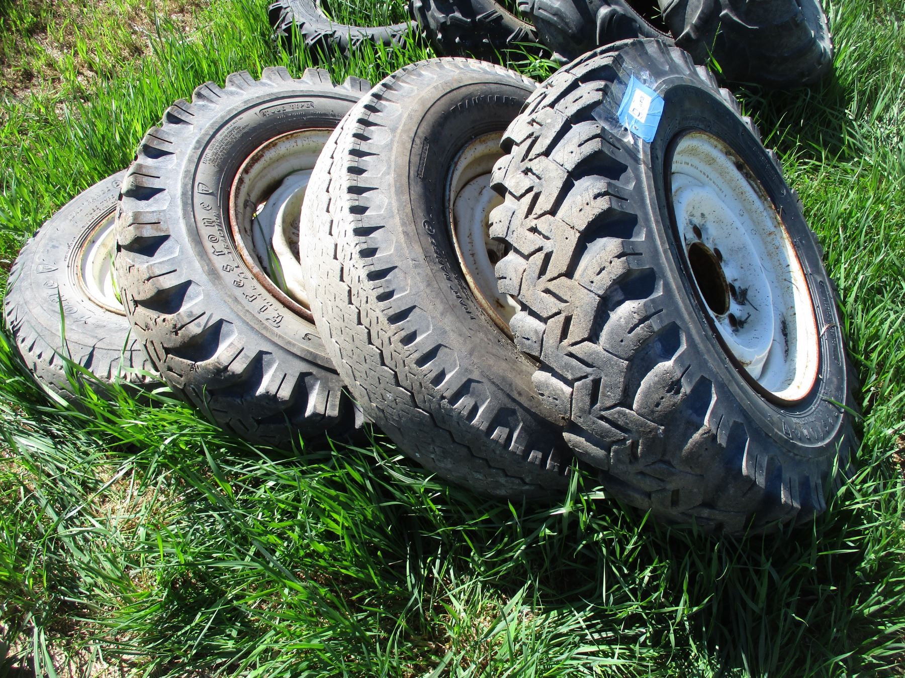 (4) tires + rims 7.5-16LT