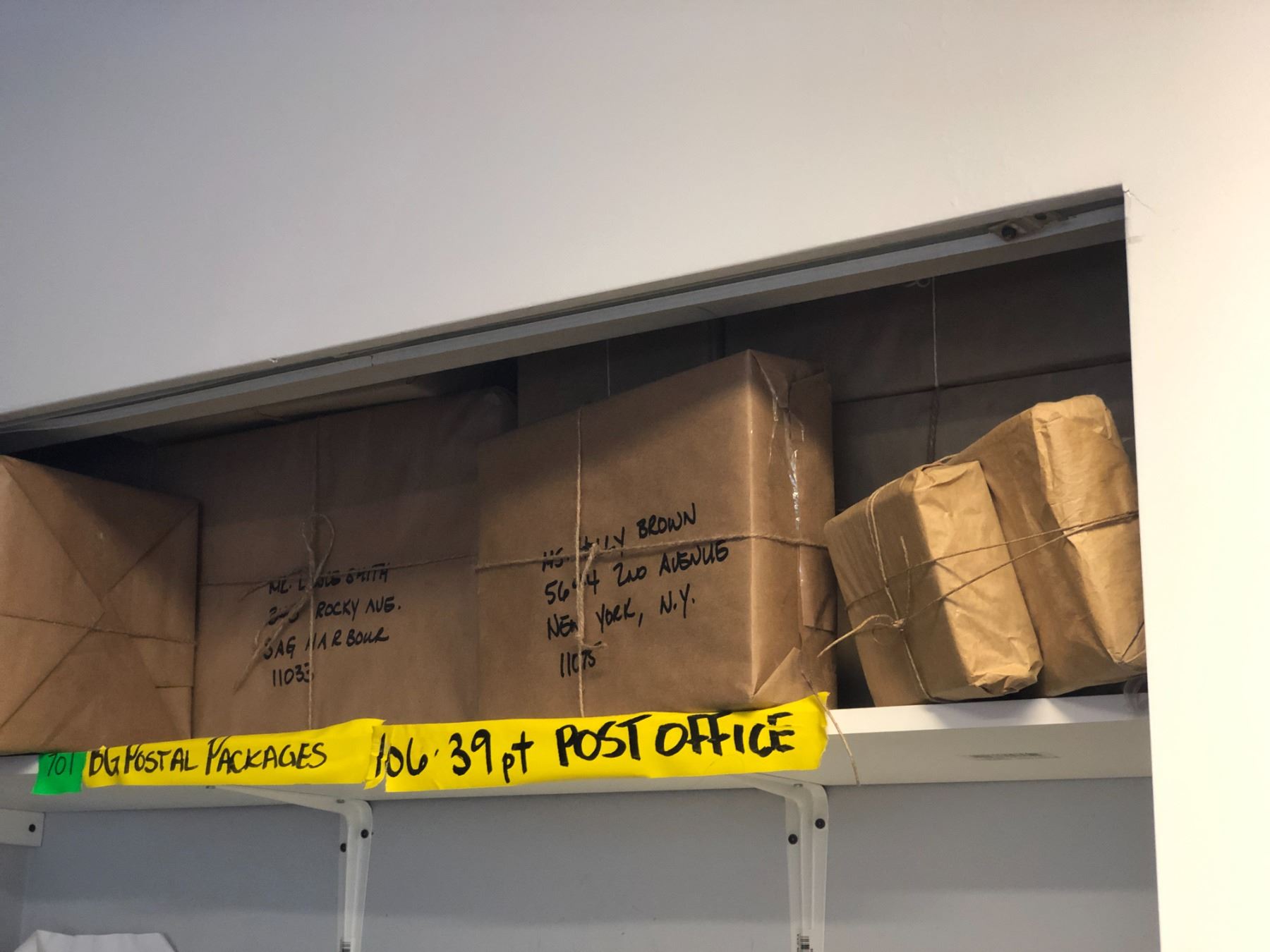 Group of 9 post office postal packages props (From the superhero show)