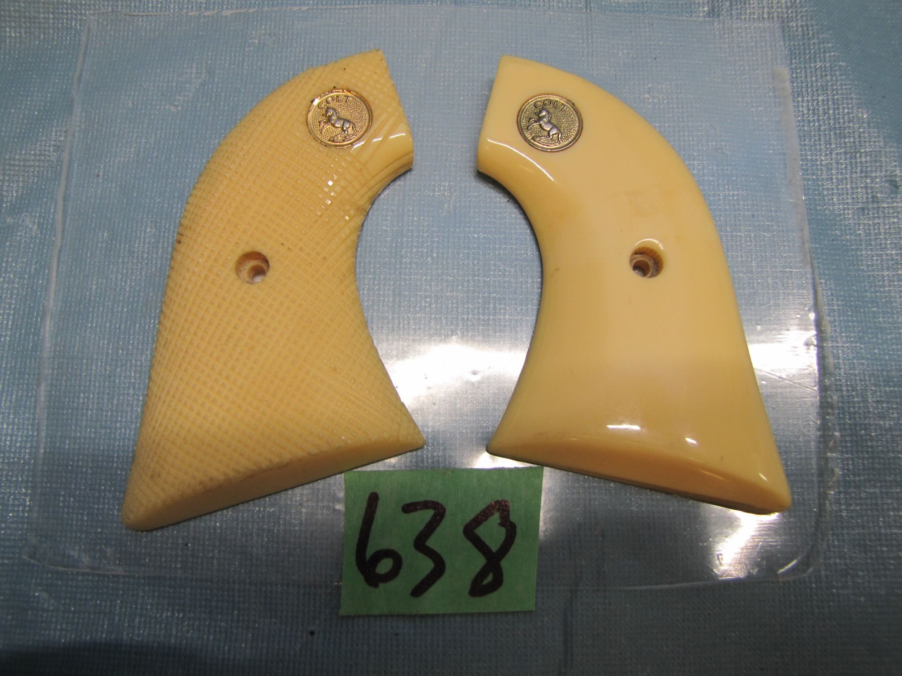 Pair of colt 1873 single action army pistol grips ; colt emblem ; Ivory ...