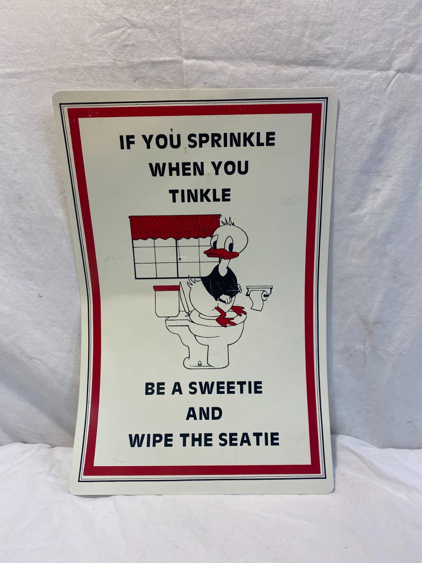 If you sprinkle when you tinkle sign