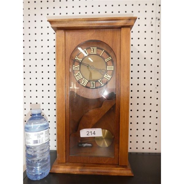 clock in wooden casing