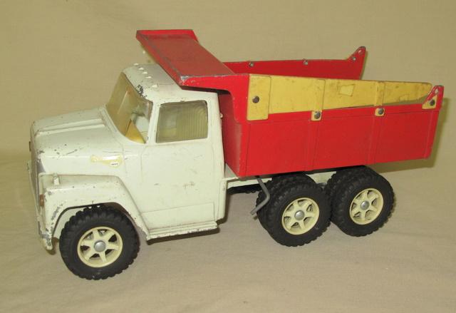 IH Loadstar Red & White dump Truck w/ white spoke rims