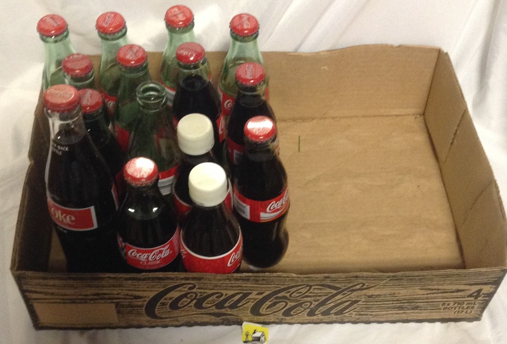 Coca Cola box and bottles