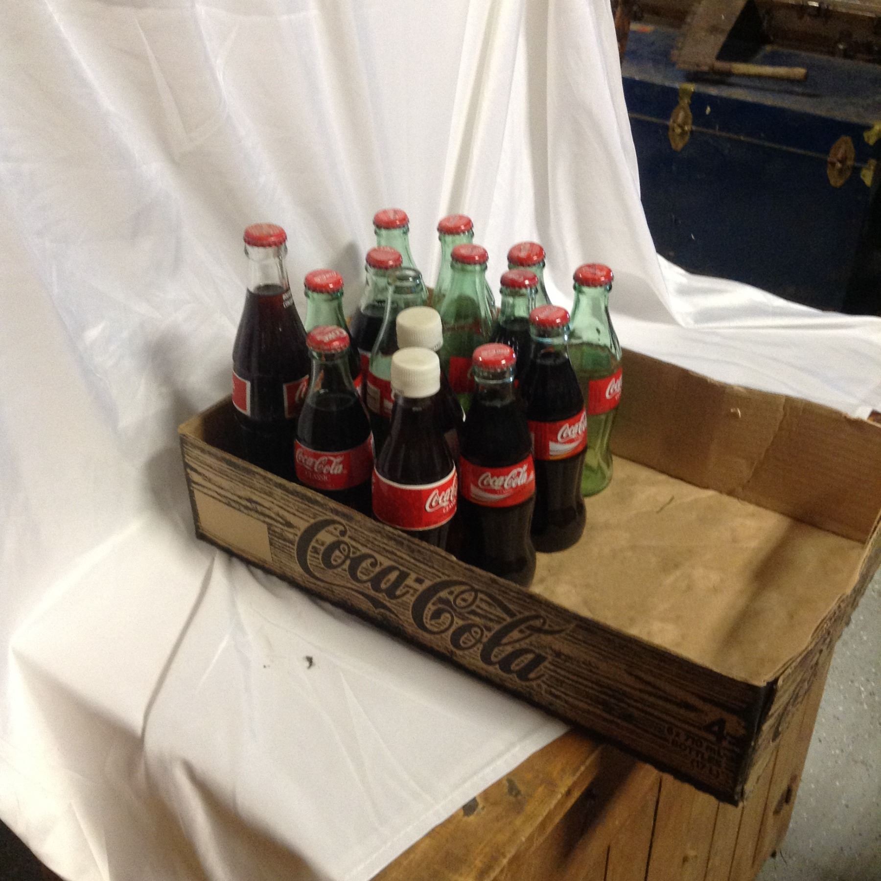 Coca Cola box and bottles