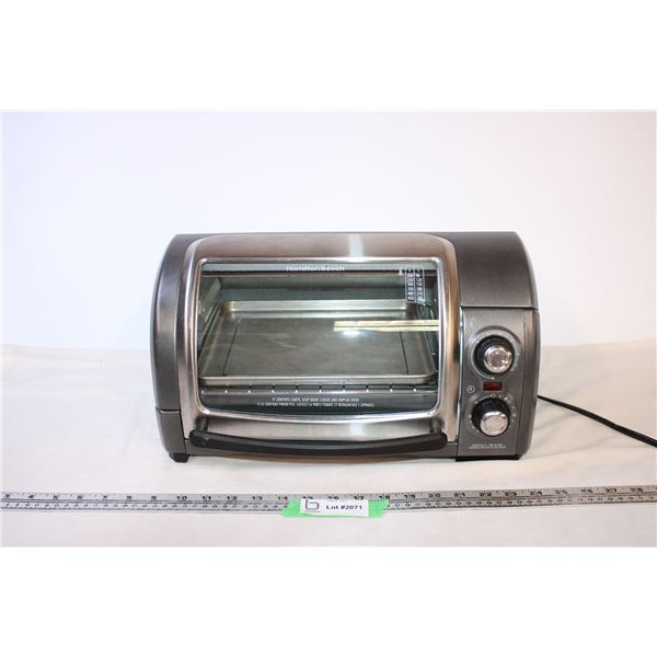 Hamilton Beach Toaster Oven Turns On
