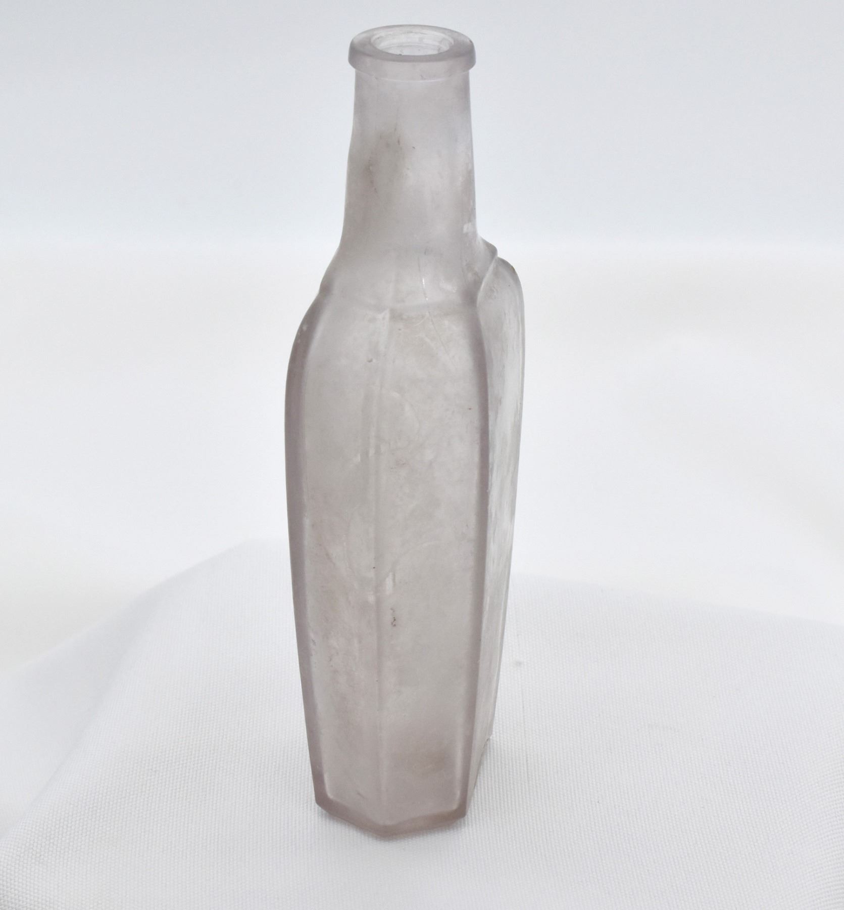 Antique Sun Purple Glass Coffin Bottle