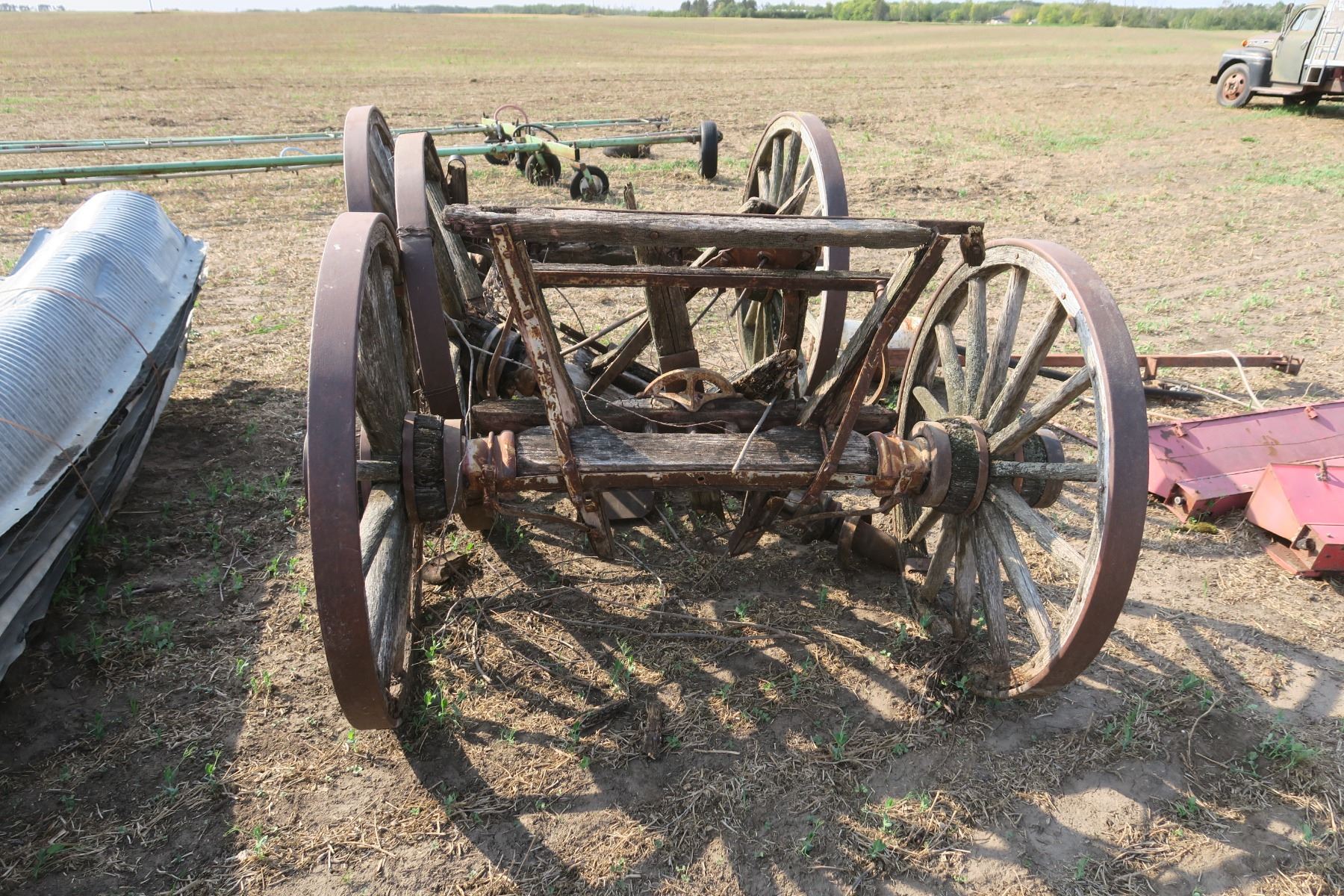 Lot of Wagon Wheel parts & Axles - 42 & 48" Wheels - Schmalz Auctions