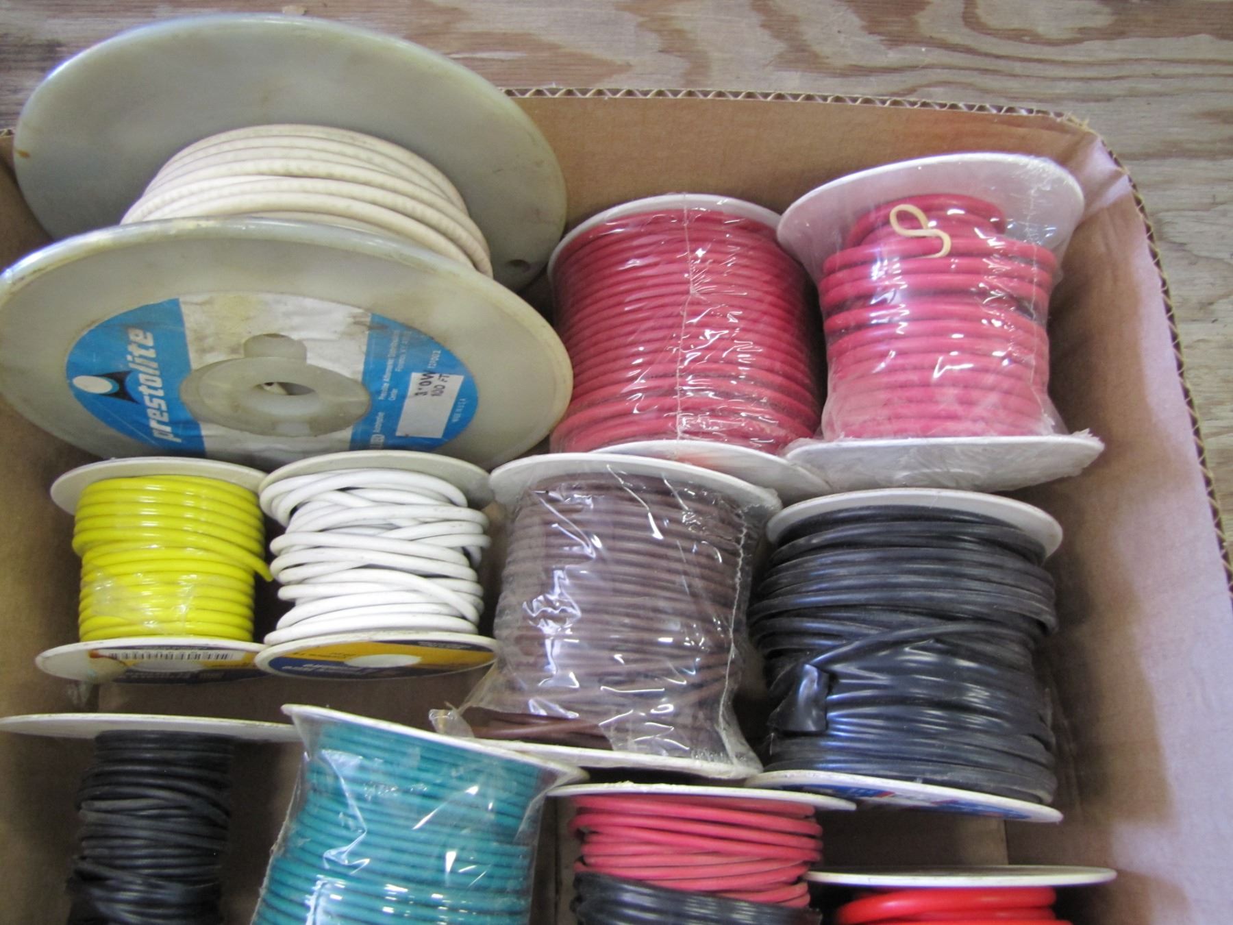 Box with soldering guns and electrical wire