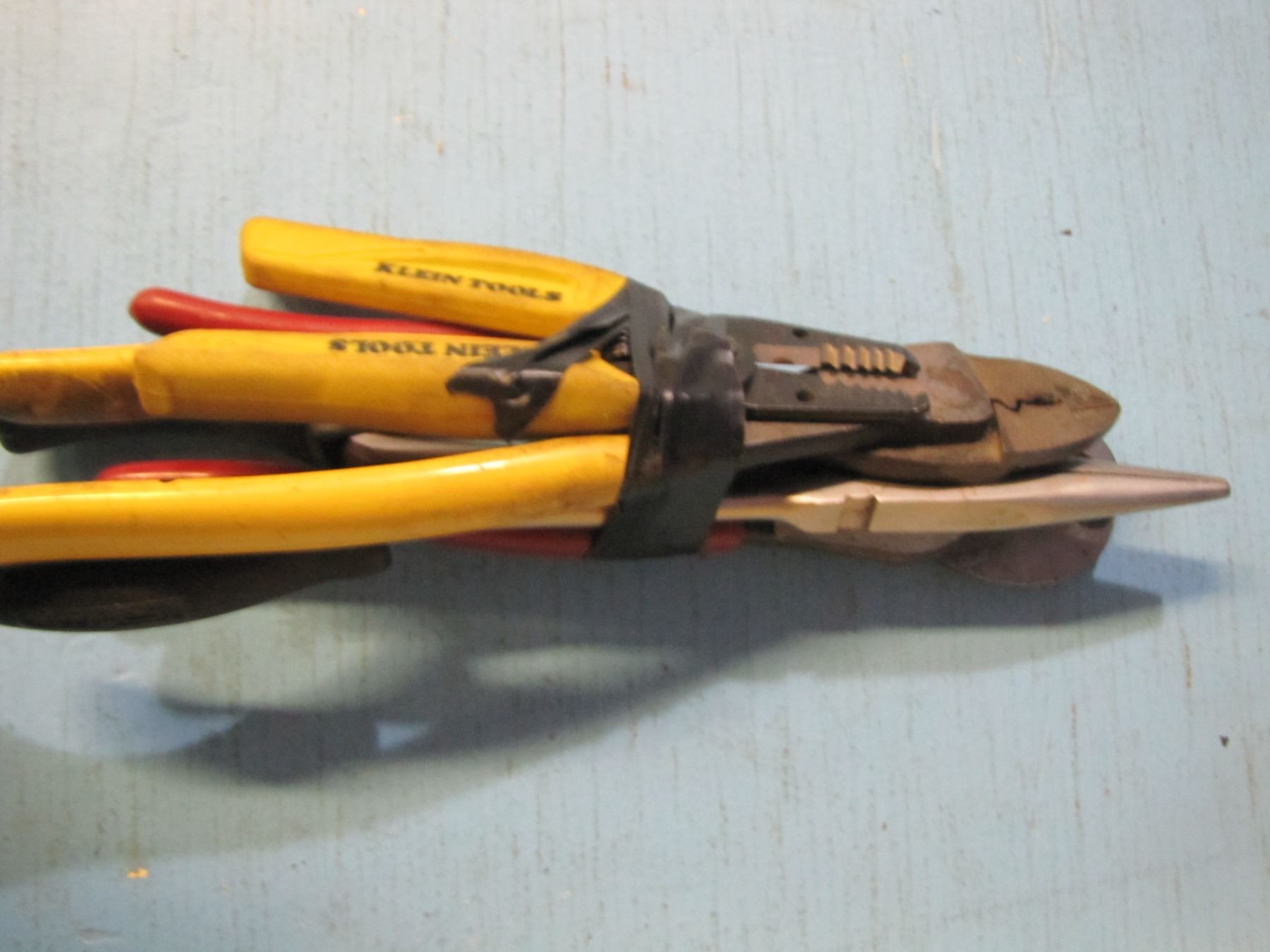 Cable cutters , wire strippers, needle nose pliers