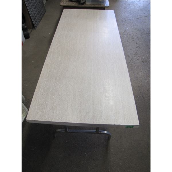 Lot of two 6 foot arborite top folding tables