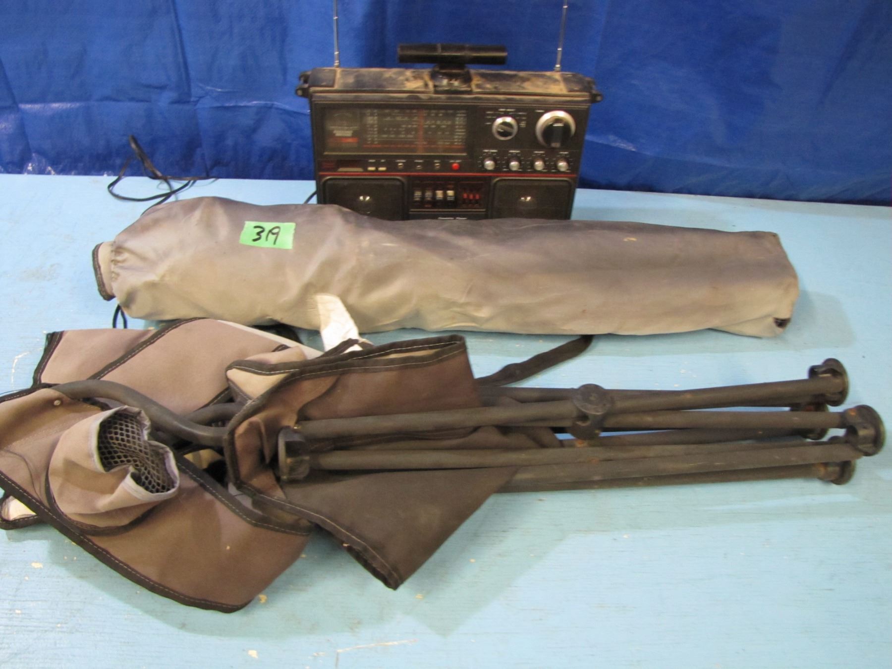 lot with two folding chairs and radio