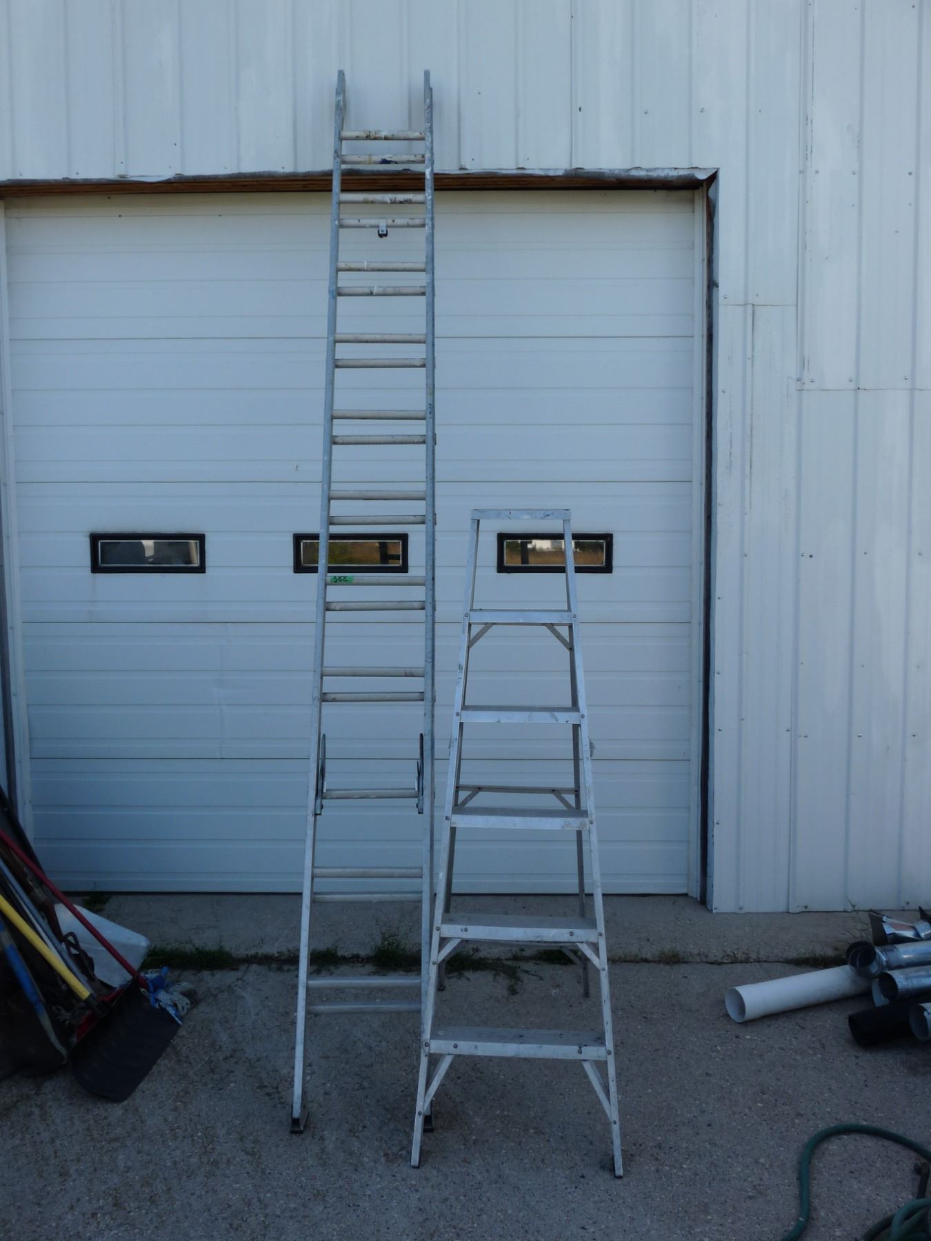 20 foot aluminum ext ladder and six foot aluminum step ladder