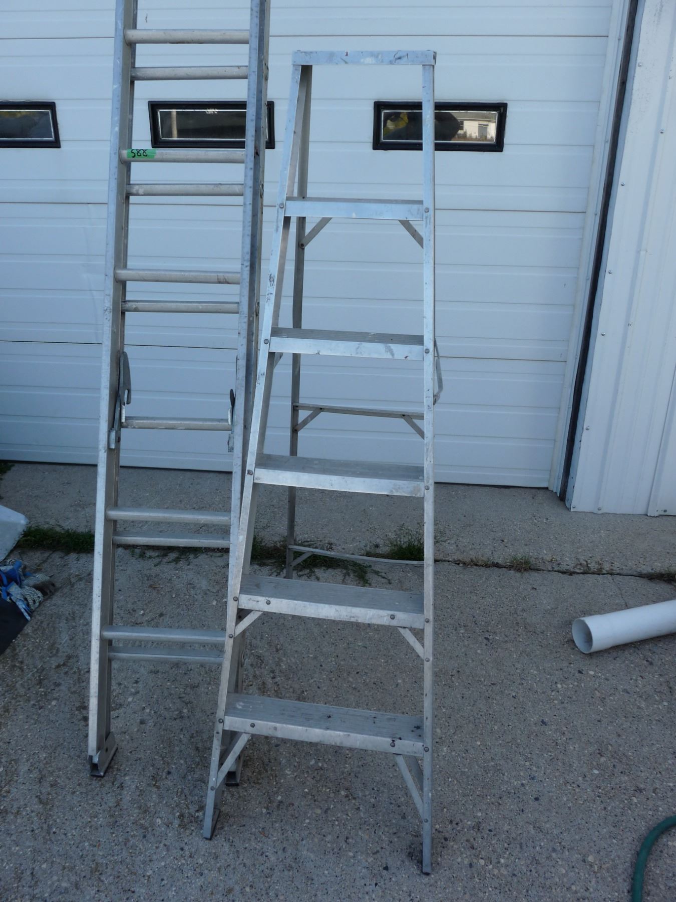 20 foot aluminum ext ladder and six foot aluminum step ladder