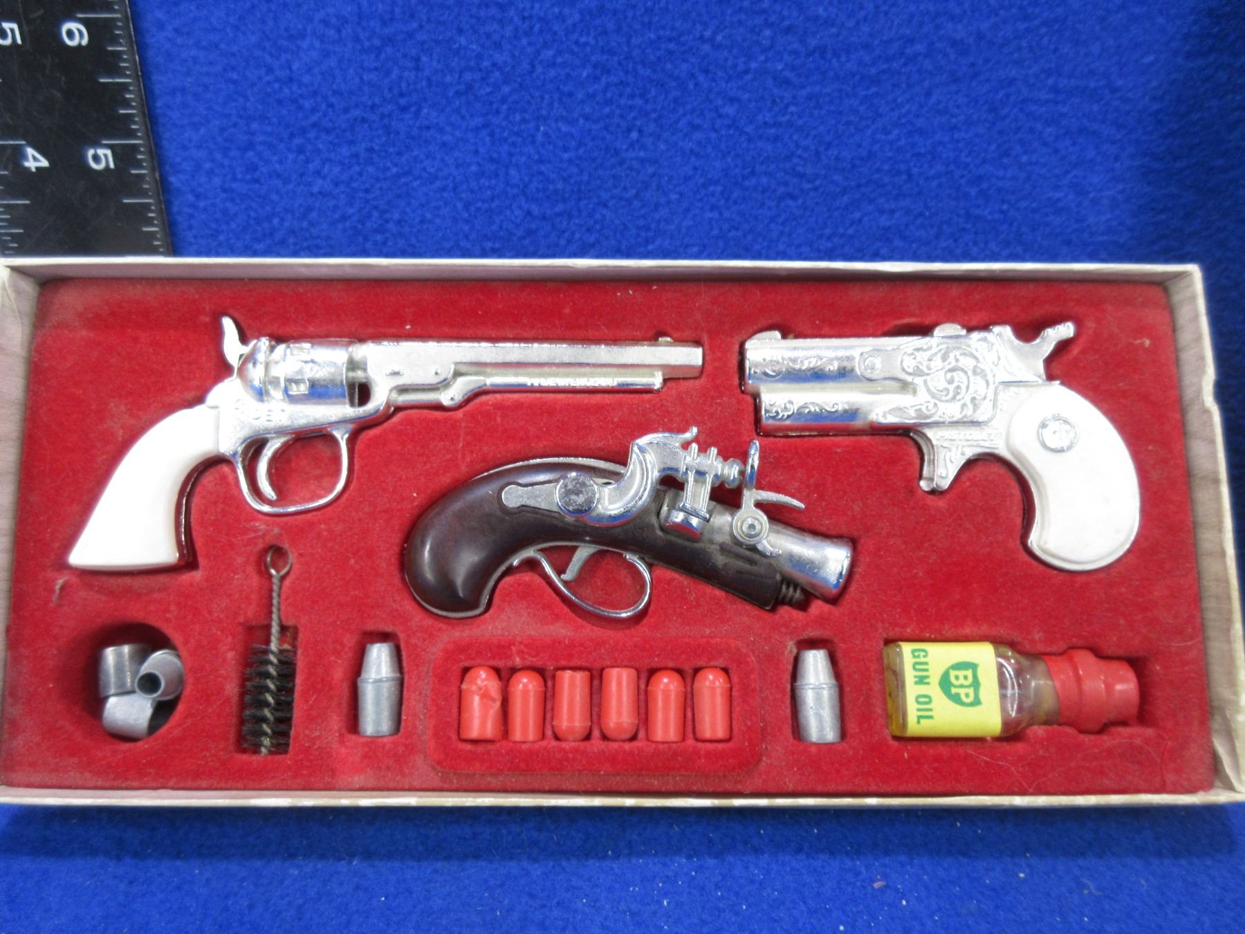 The Outlaw Presentation Case of Miniature Antique Firearms