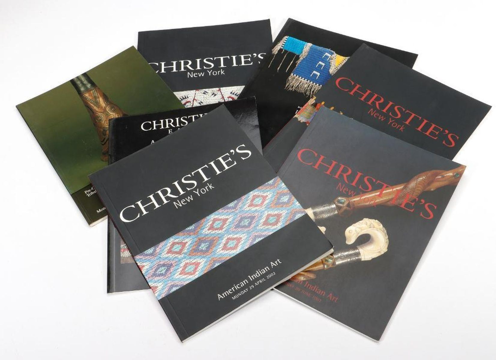 Twenty-six Christies Native American Art auction catalogues.