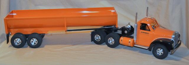 Custom S-M Orange Semi Truck w/ Cable op Dump Trailer