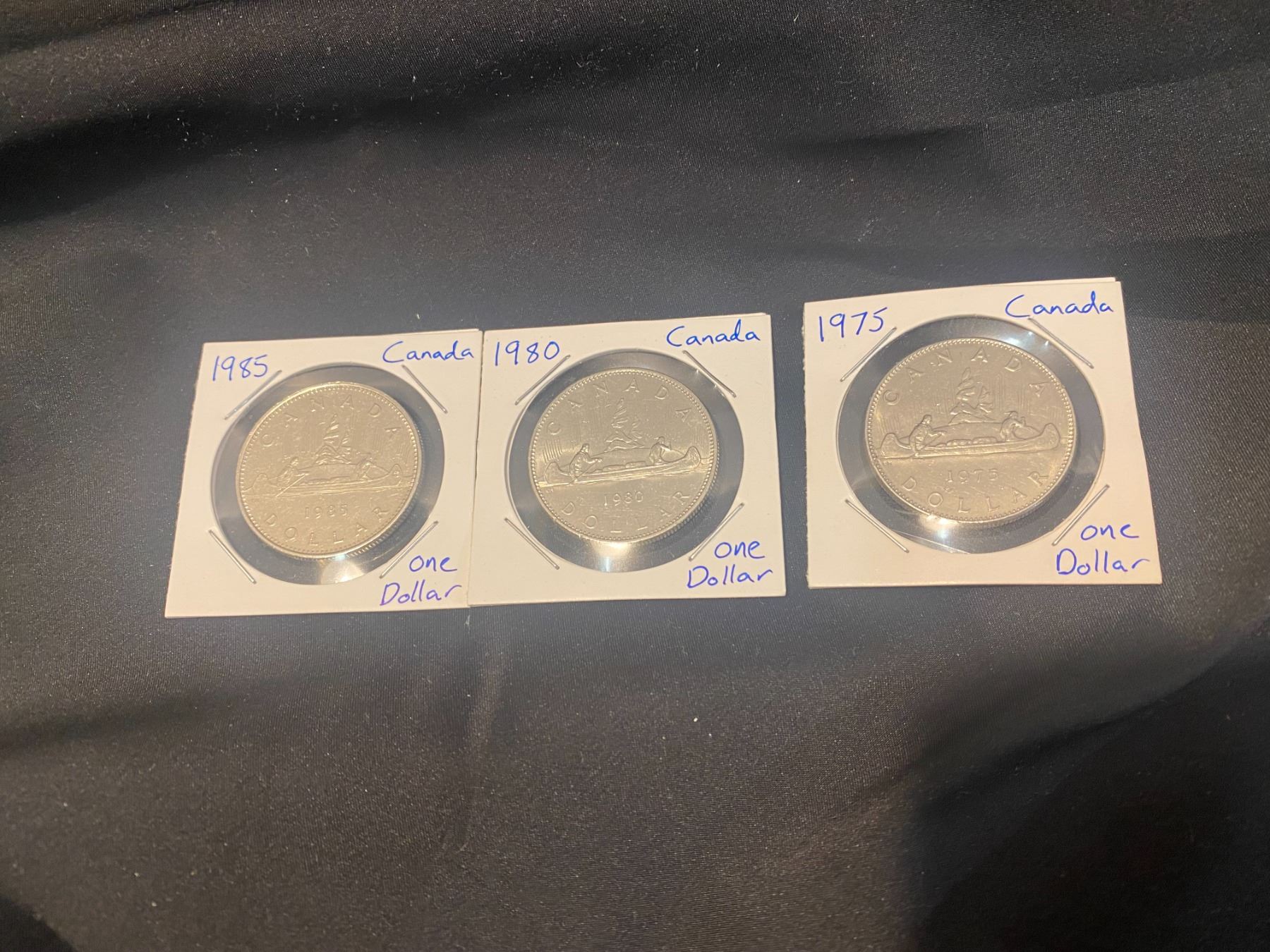3 Canada $1 coins