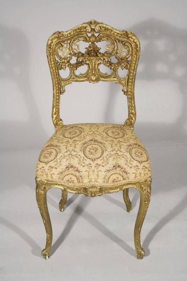 A Louis XV French Rococo Carved and Gilt Side Chair.
