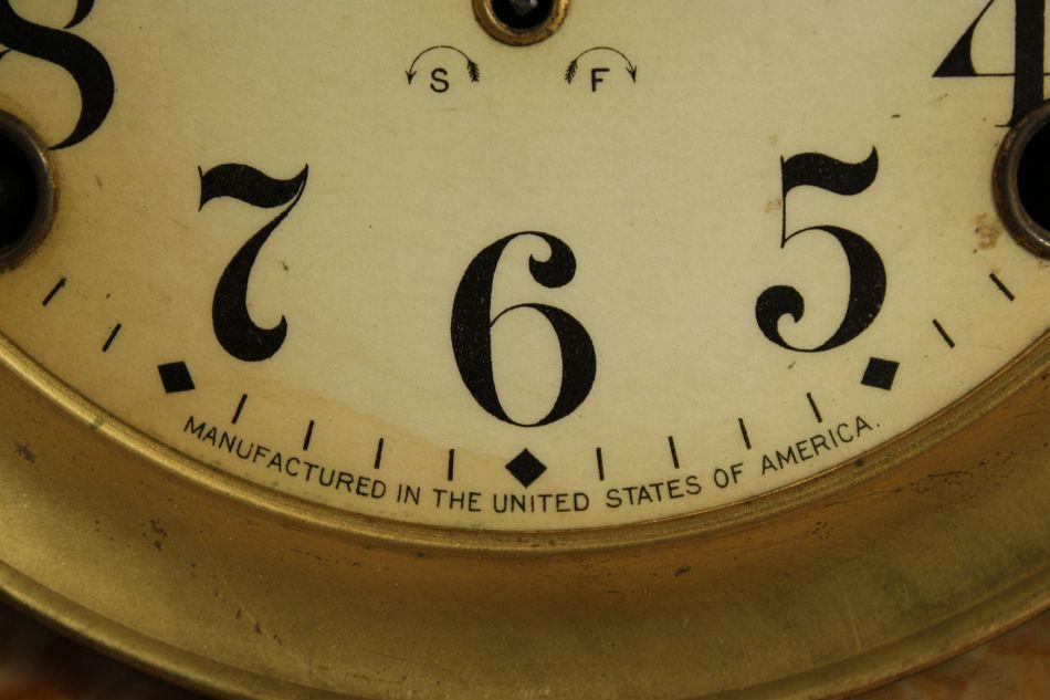 A Seth Thomas Faux Marble Mantle Clock.