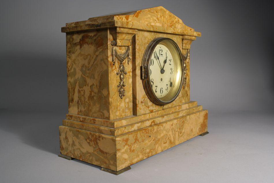 A Seth Thomas Faux Marble Mantle Clock.