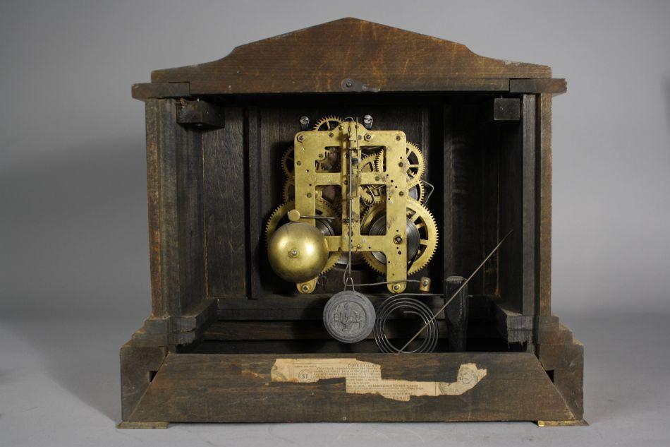 A Seth Thomas Faux Marble Mantle Clock.