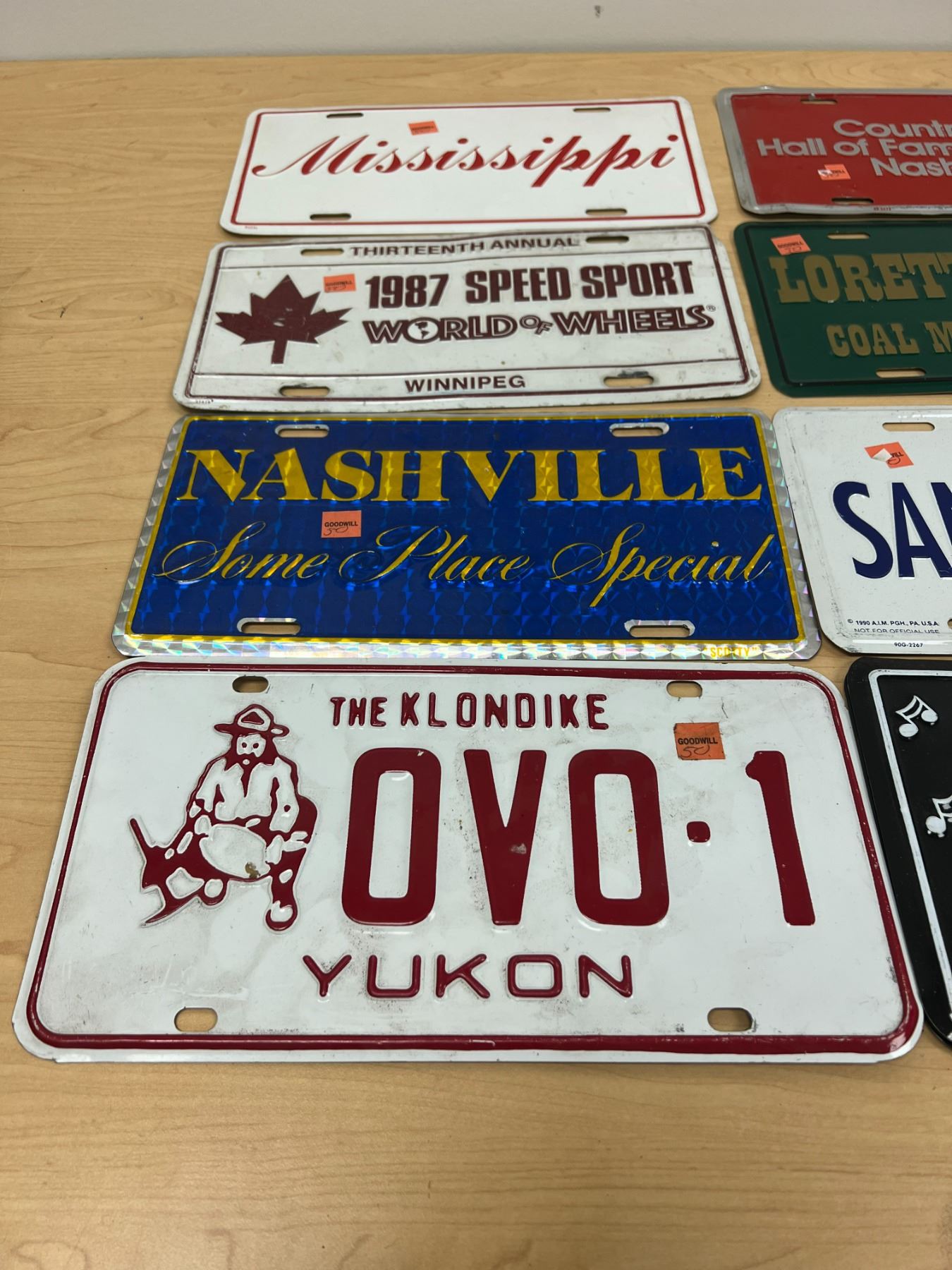 Lot of 8 Collectible License plates Yukon / Country music theme etc see ...