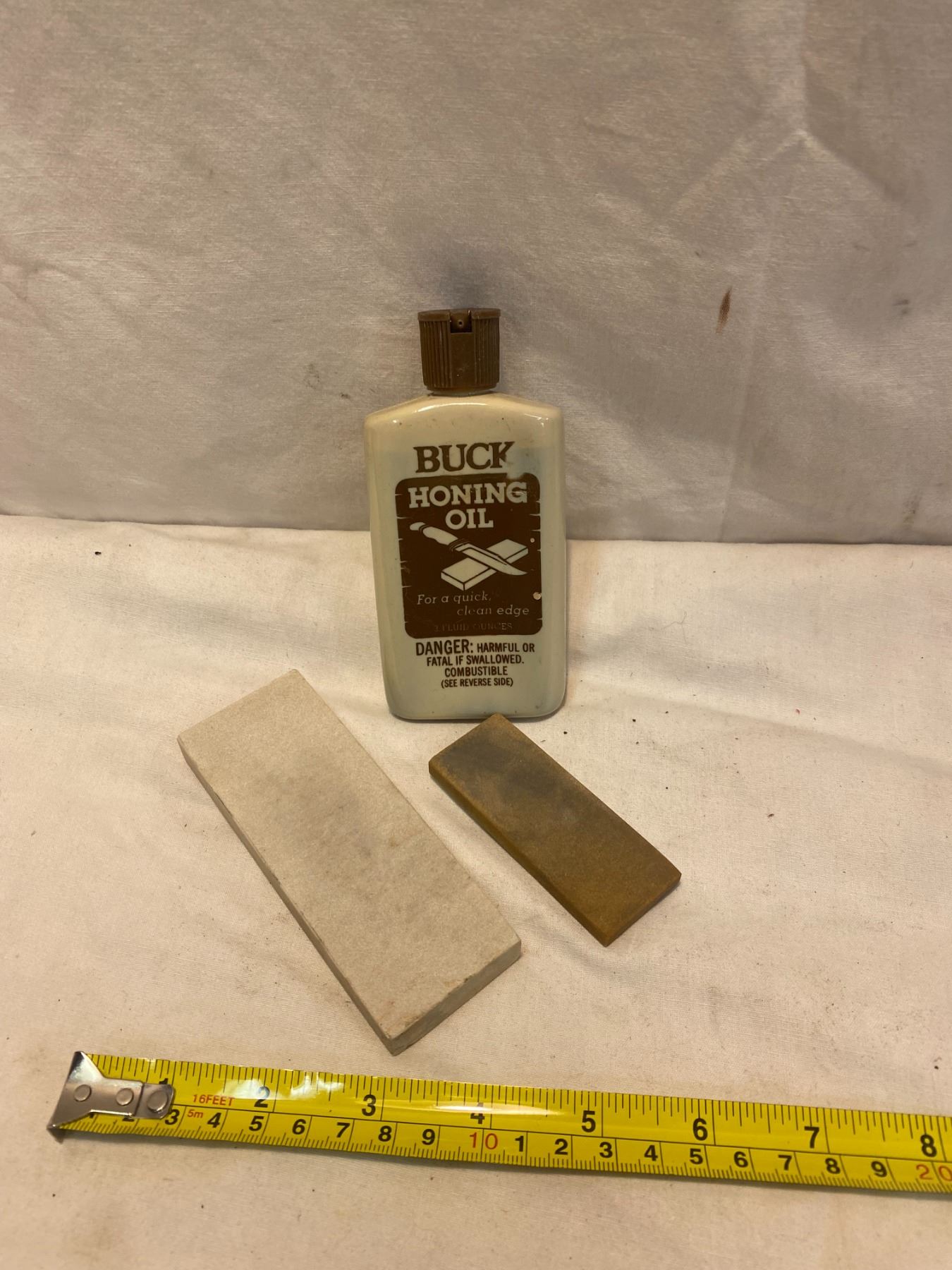 Buck honing oil and stones