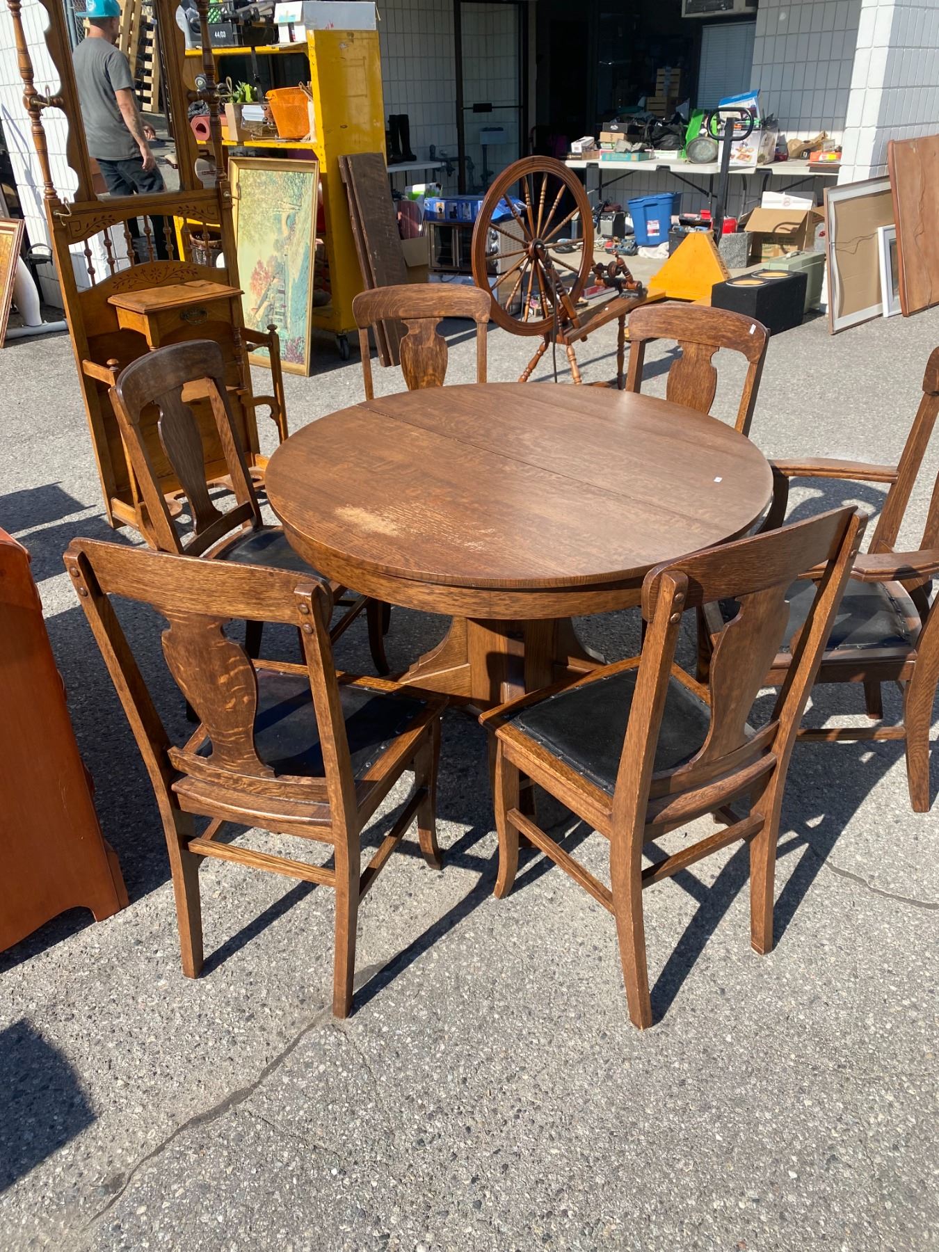 Antique oak table and 6 chairs and three leaves