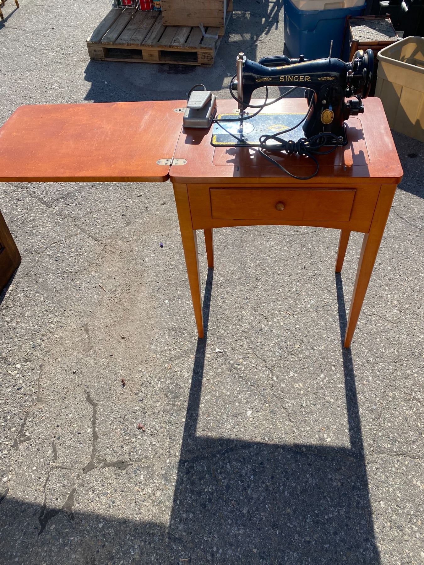 Singer sewing machine in table and sewing stool