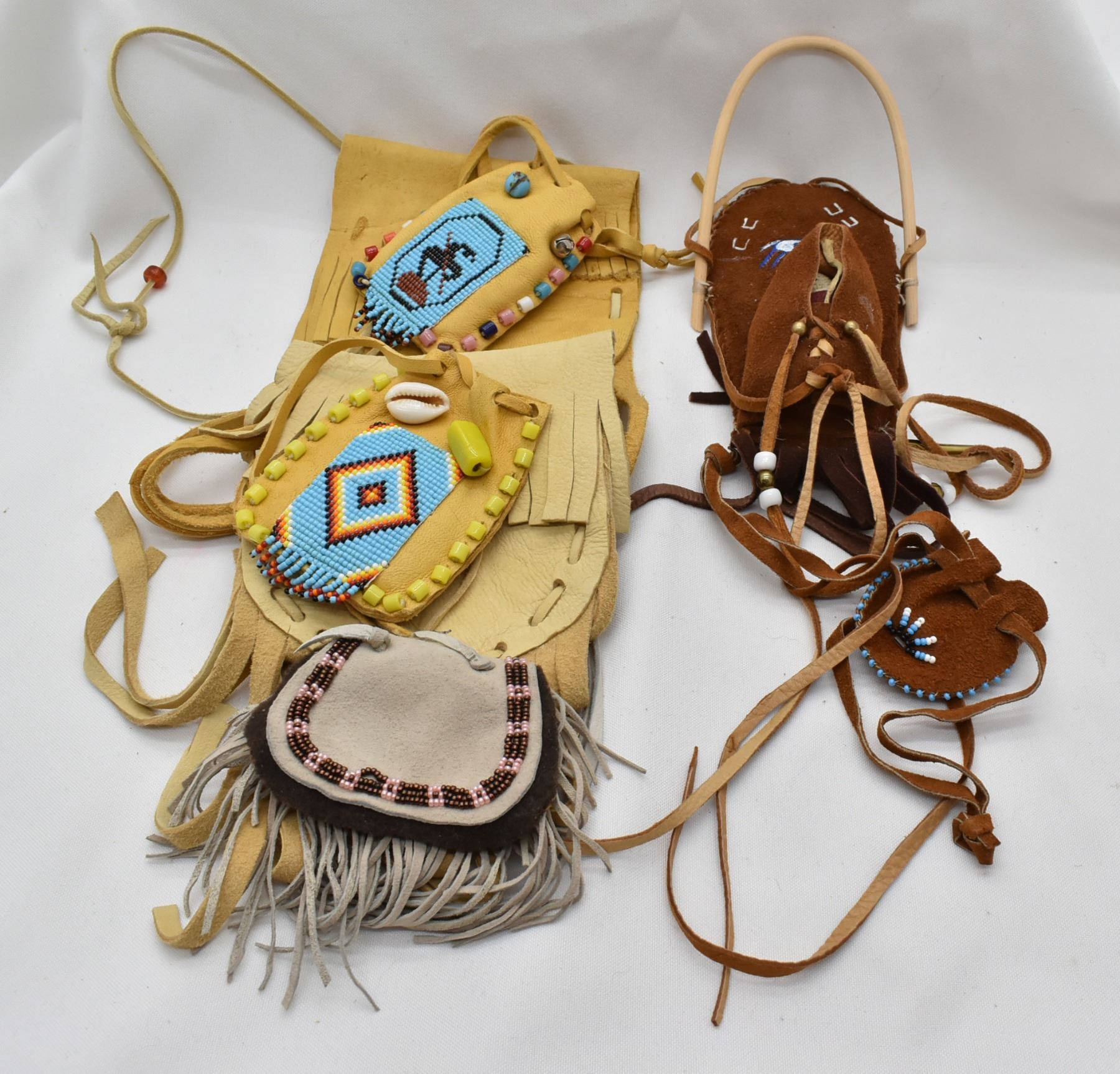 7 Native American Leather Bags, Some Beaded