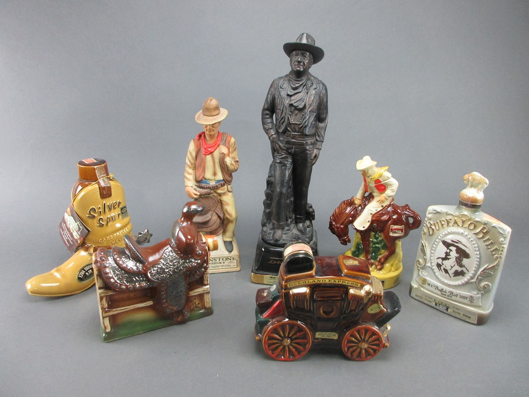 7 Western Empty Whiskey Bottles