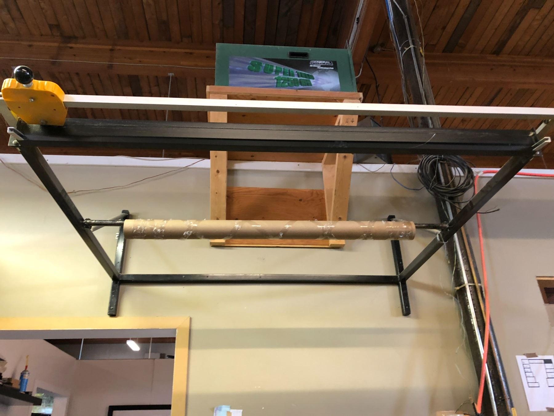 Wall mount roller