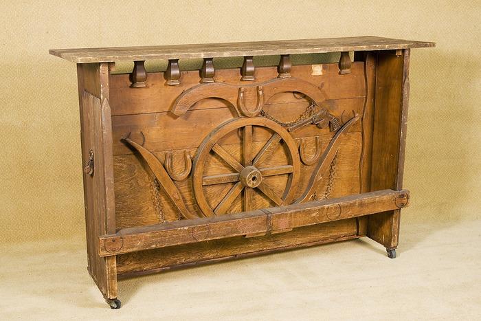 Western Style Cowboy Bar with Carved Wood Cowboy Installation