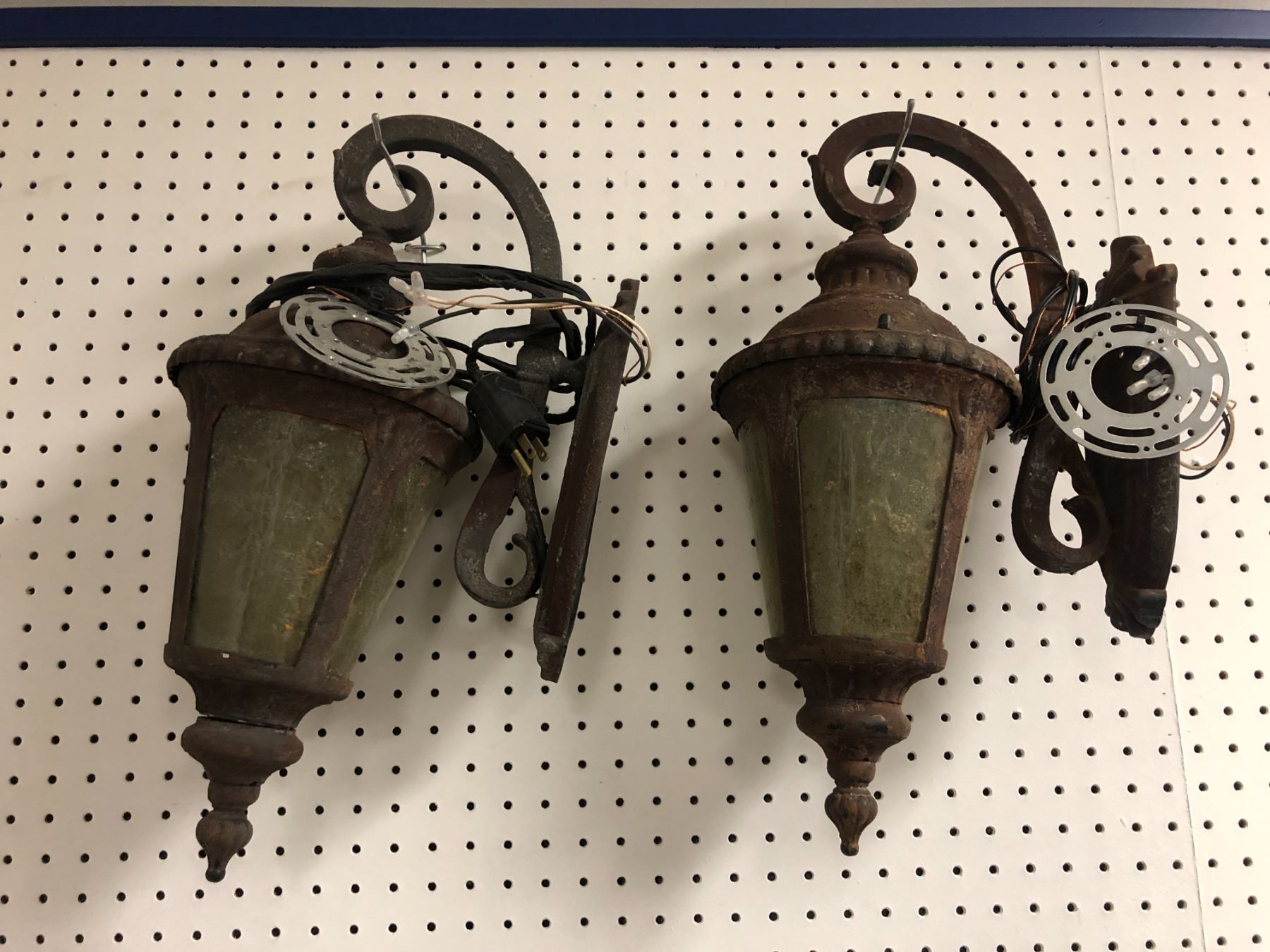 "The Horror Show" - Pair of wrought iron wall mount light fixtures