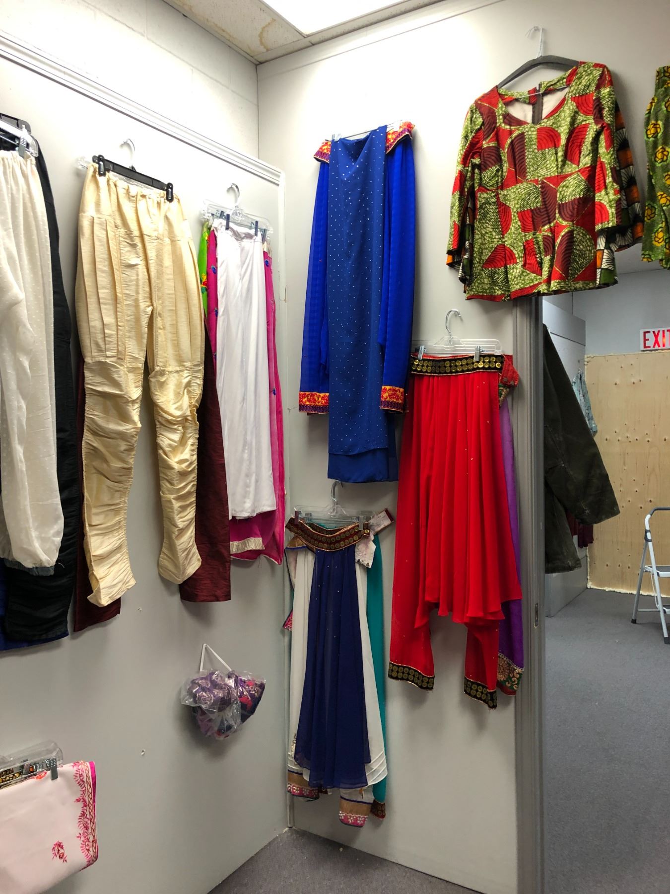 Large group of assorted Indian and African outfit - includes vests/long ...