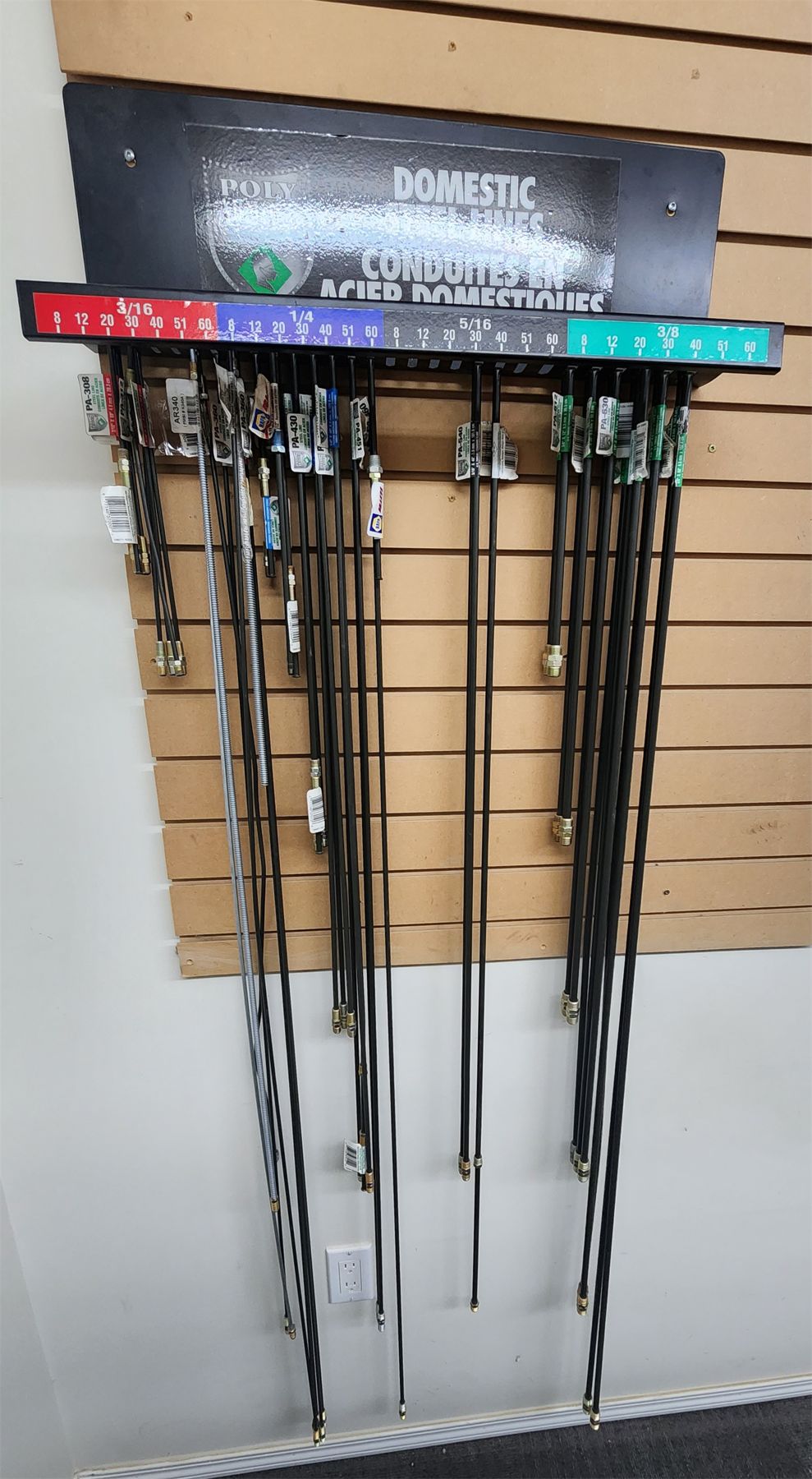 2 POLY ARMOUR STEEL LINE WALL DISPLAYS WITH CONTENTS