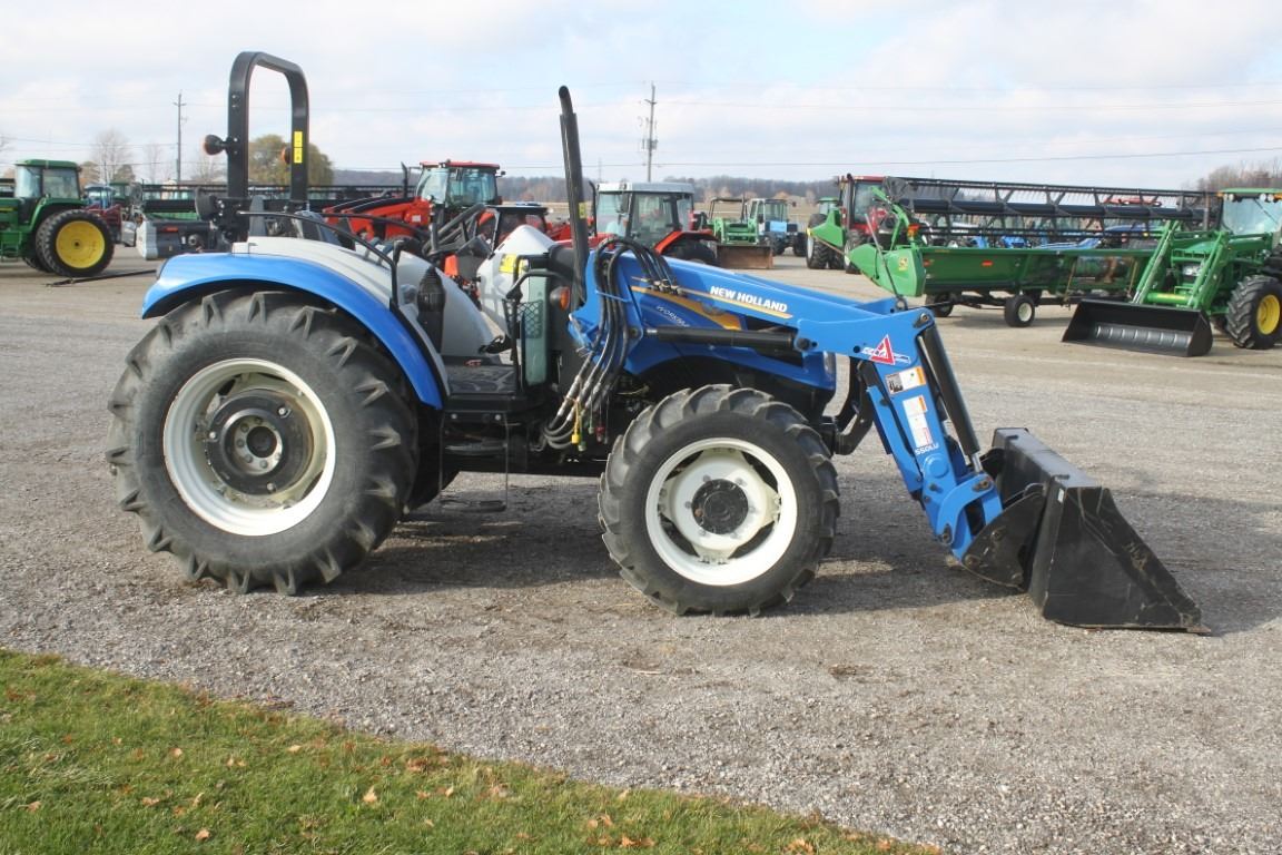 New Holland WorkMaster 75 4wd tractor, rops, 550LU loader, 12x12 ...