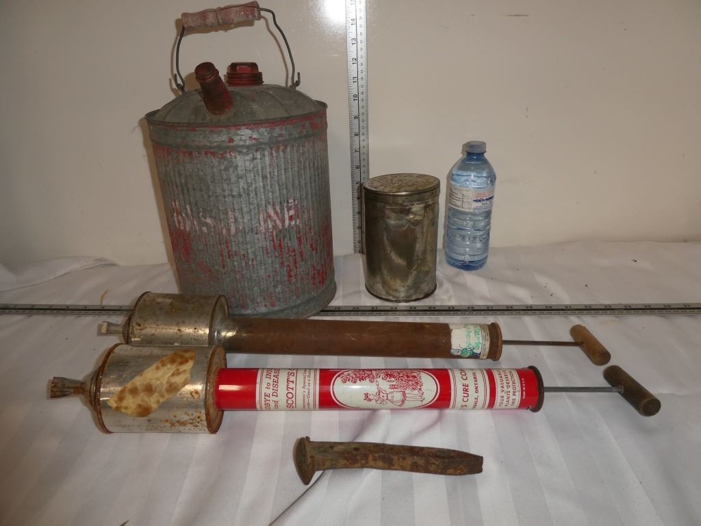 Antique Gas Can, Sprayer and Rail Road Nail