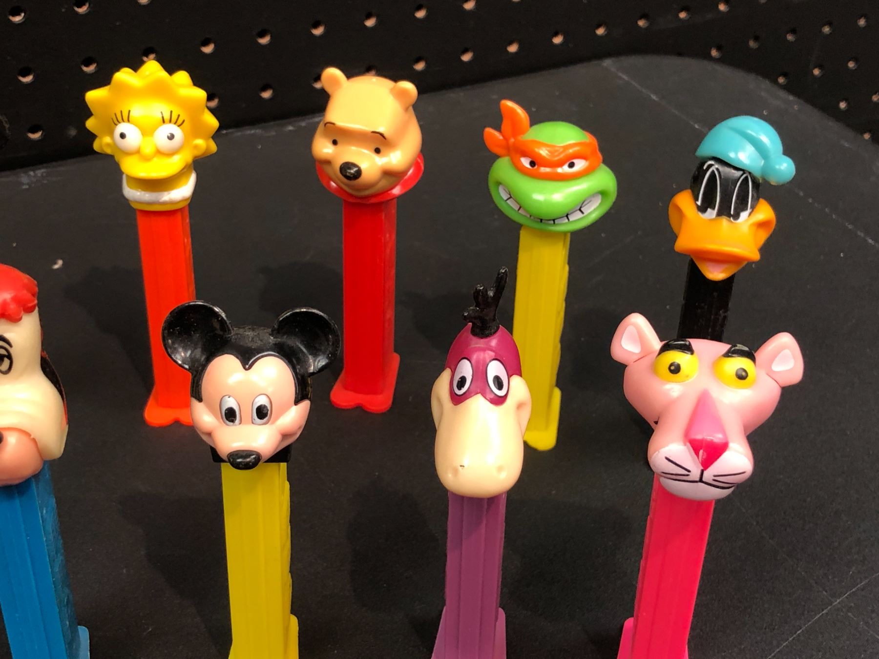 Group of 22 vintage PEZ nostalgic cartoon head candy dispensers & PEZ candy