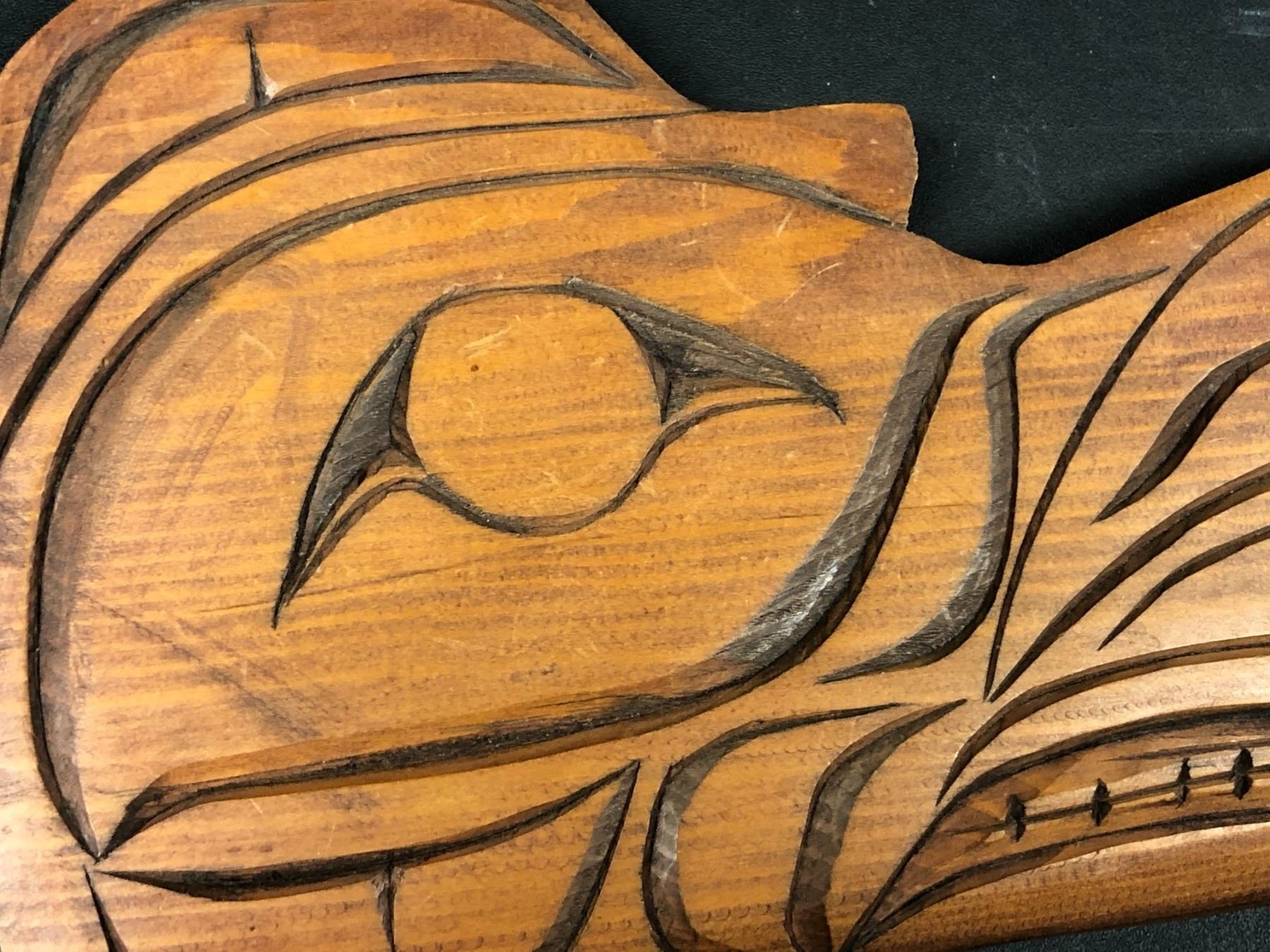First Nations decorative wood carved wolf head signed by artist Ivan Wilson