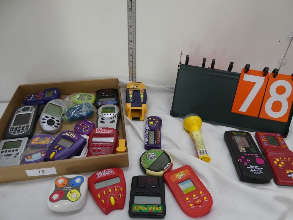assorted hand-held electronic games