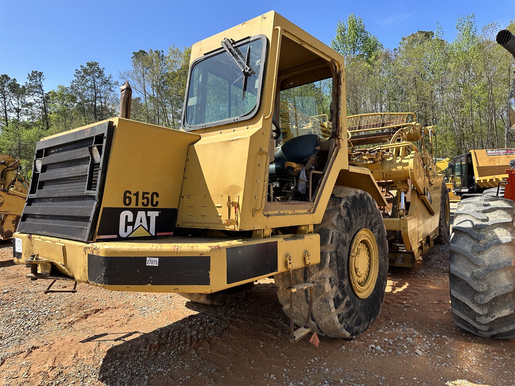 1995 CAT 615C II Motor Scraper - J.M. Wood Auction Company, Inc.