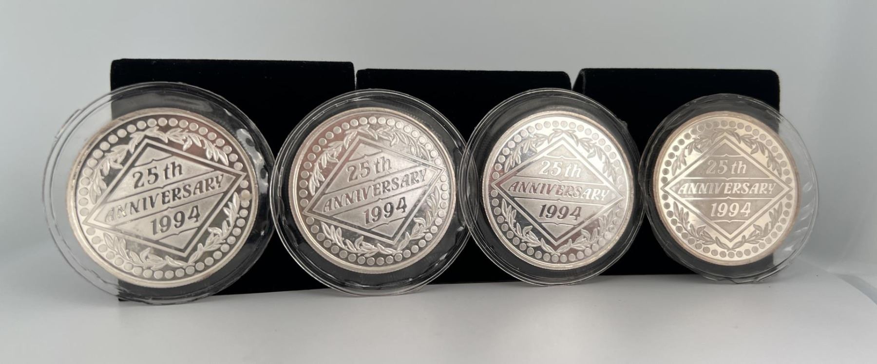 Group of 4 25th Anniversary Silver 1oz Rounds