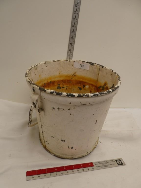 very heavy solid metal bucket