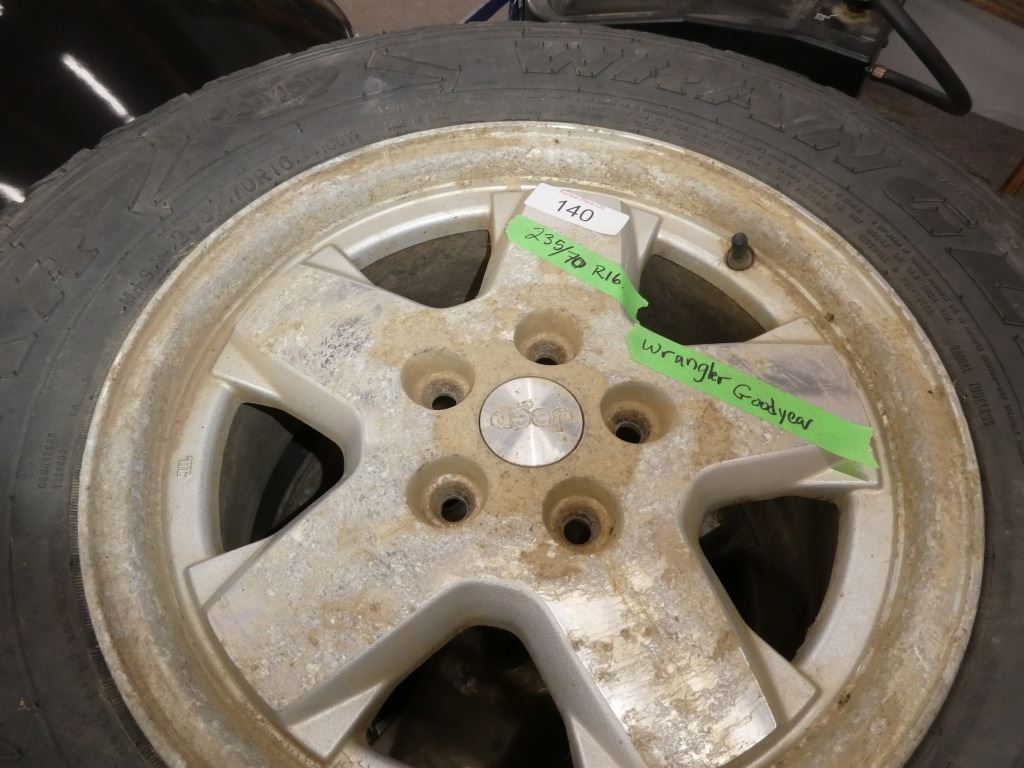 Wrangler Good Year 235/70 R16 tires w/ rims