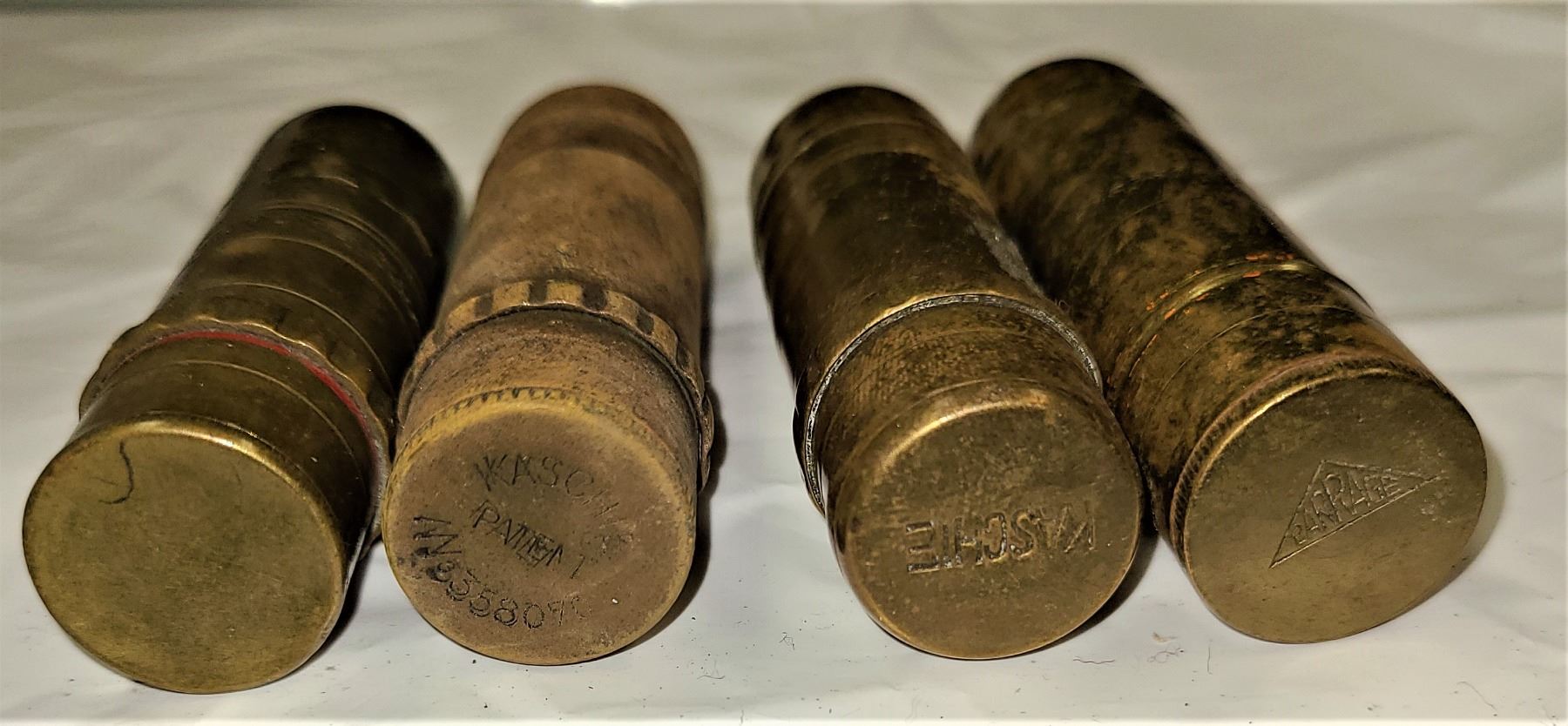 Vintage Bullet Shape Lighters in Brass - Four Lighters various makers