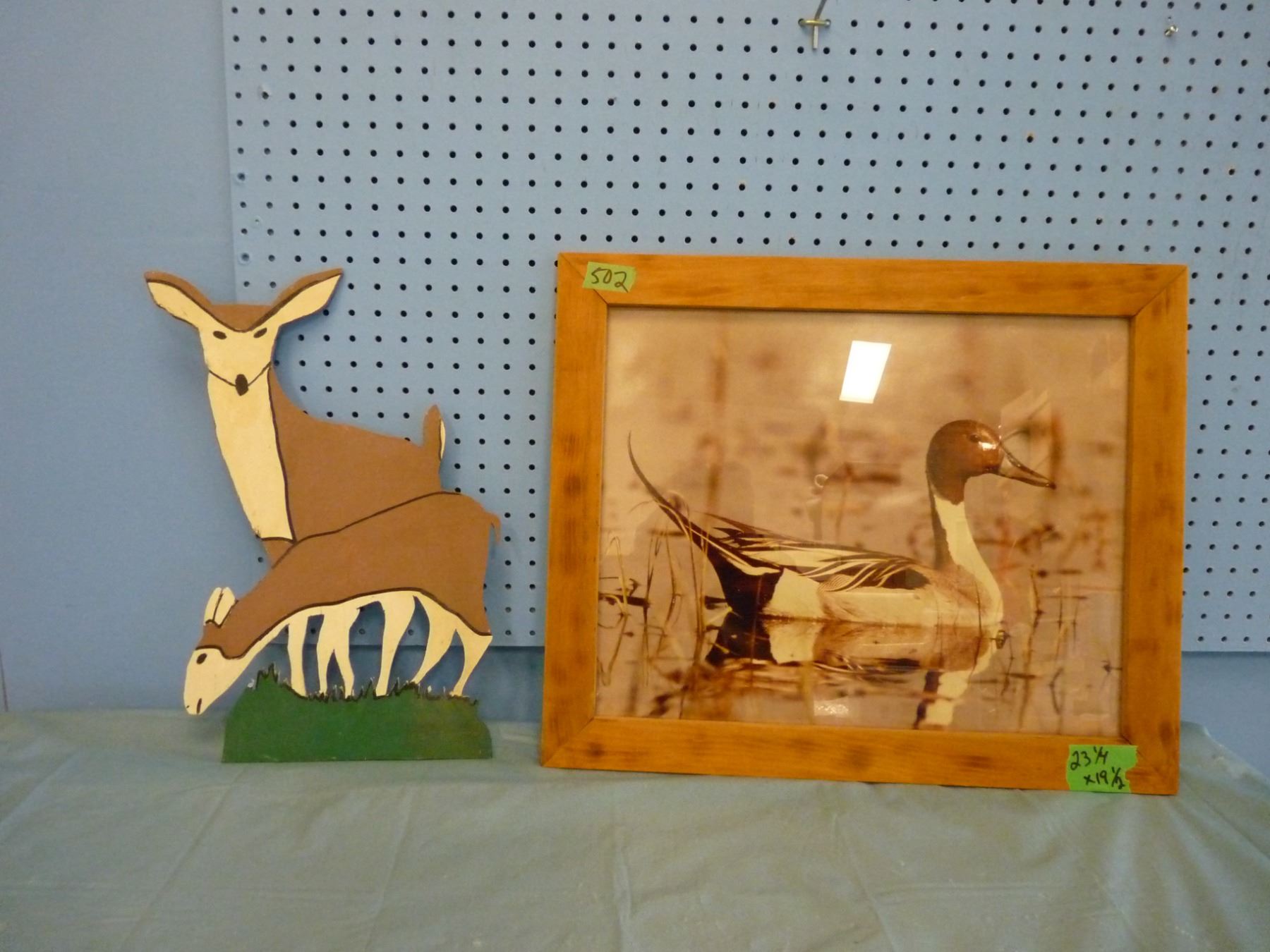 Duck picture and plywood doe and fawn cut out