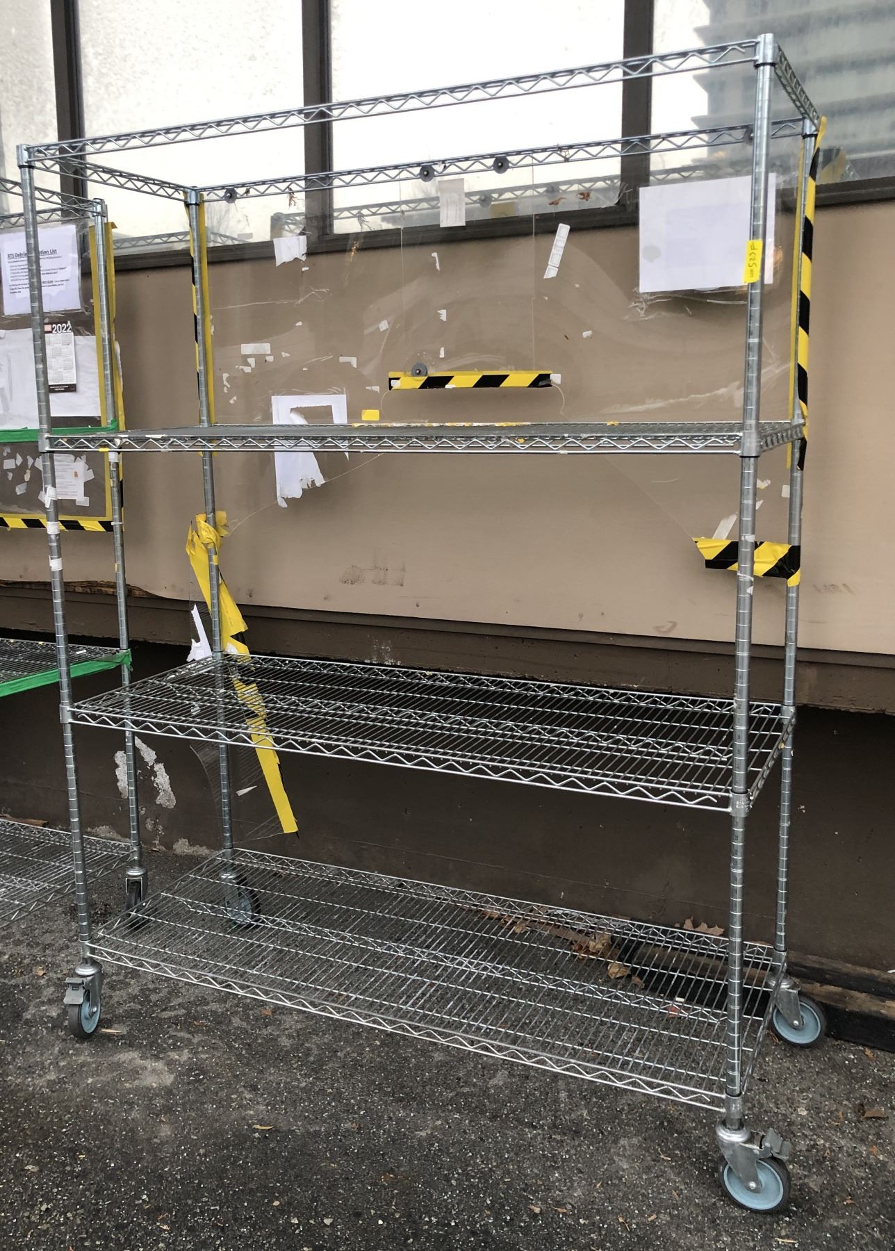 Four tier industrial rolling shelving rack (approx. 77 1/2in tall x ...